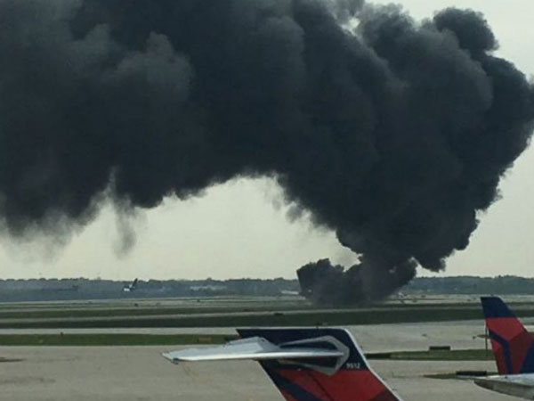20 injured after plane catches fire at O’Hare