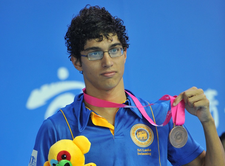 Mathew wins third place in freestyle heats