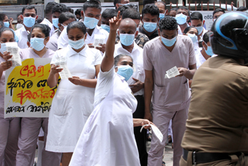 Health workers launch token strike...