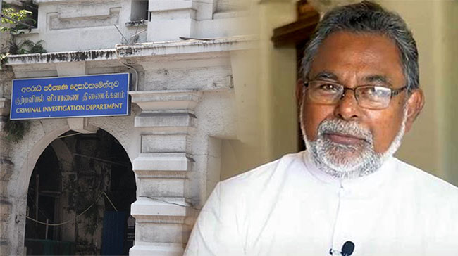 Fr. Cyril Gamini arrives at CID to record statement