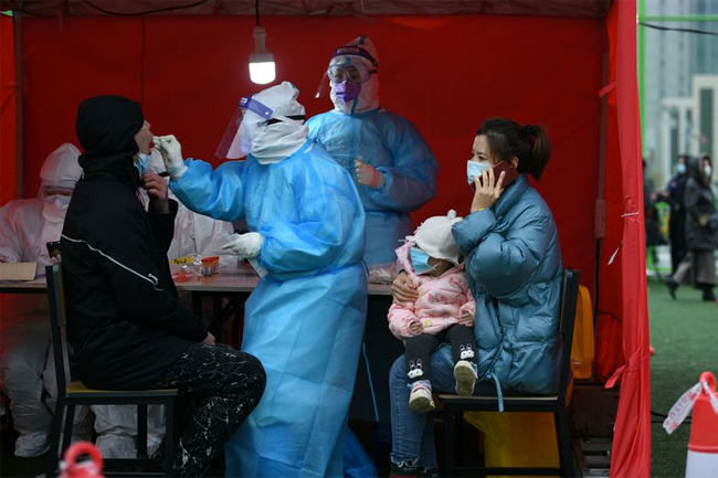 China faces new COVID outbreak as first Omicron case is detected